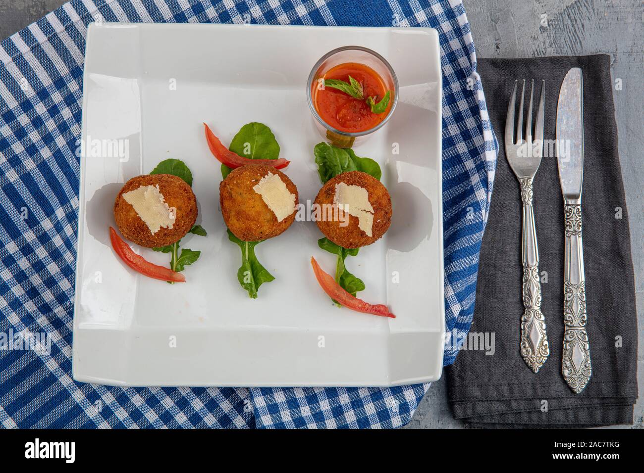 Arancini - delicious hot italian arancini. Saffron rice balls stuffed ...