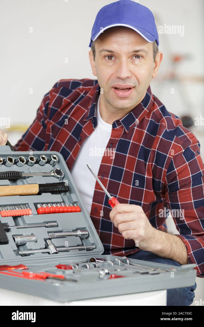 a worried worker looking at the camera Stock Photo - Alamy