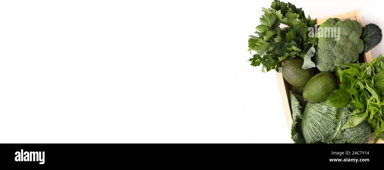 Organic green vegetables in eco wooden box isolated on white Stock ...