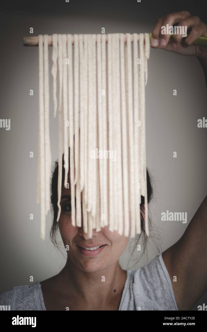 Making fresh pasta with a machine pasta hi-res stock photography and ...