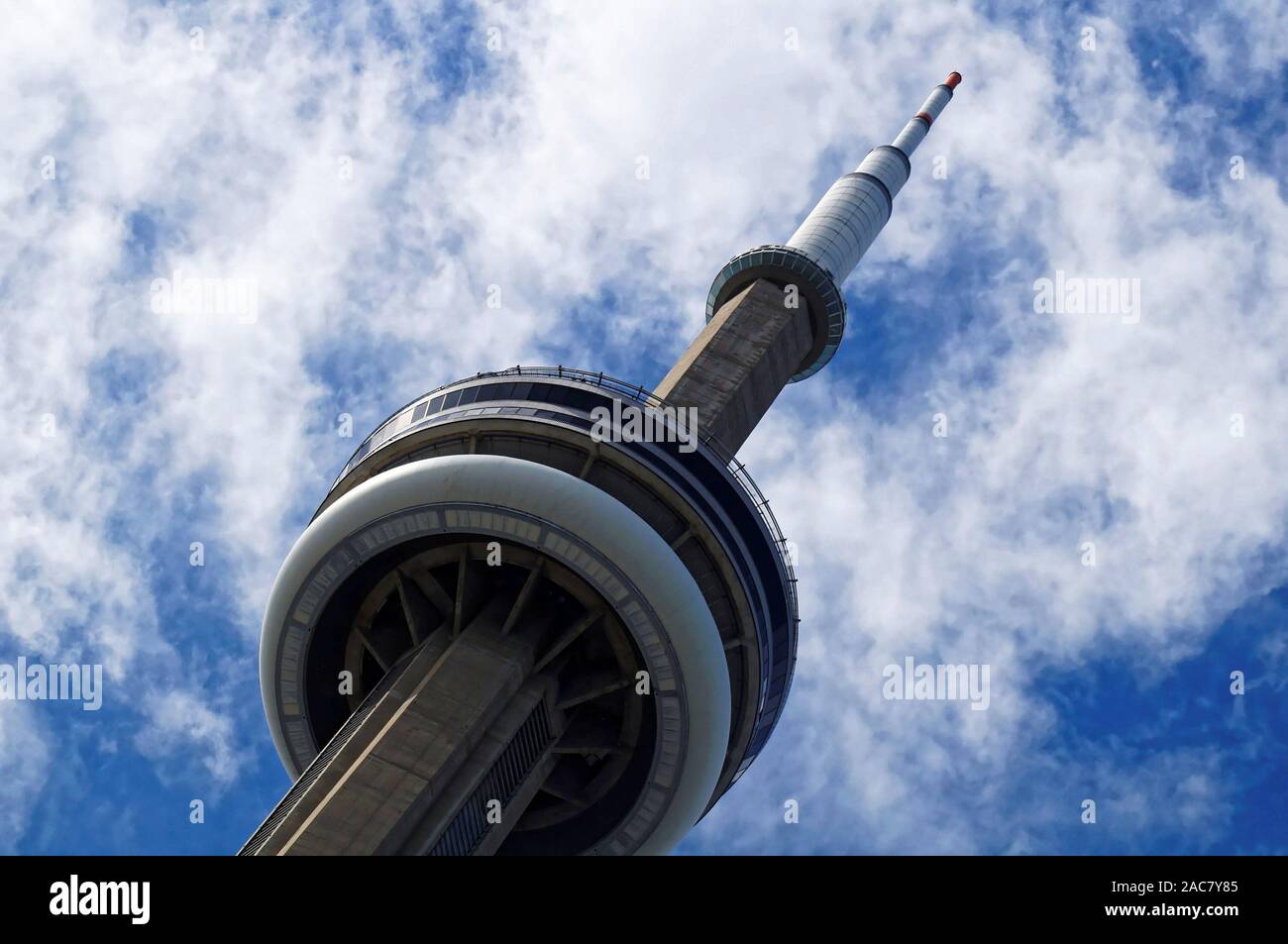 Toronto needle. CN Tower spire piercing blue sky of Toronto Stock Photo ...