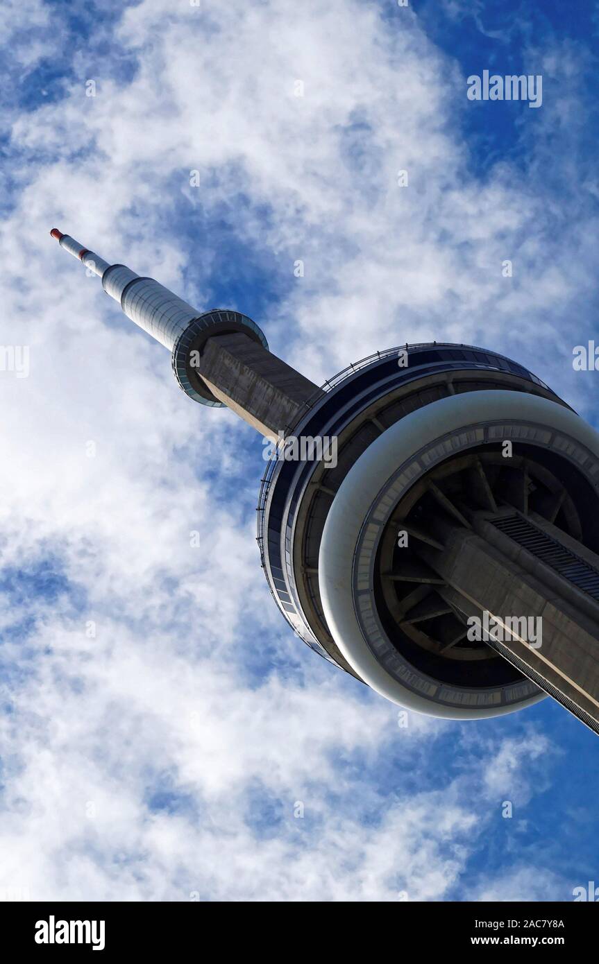 Toronto needle. CN Tower spire piercing blue sky of Toronto Stock Photo ...