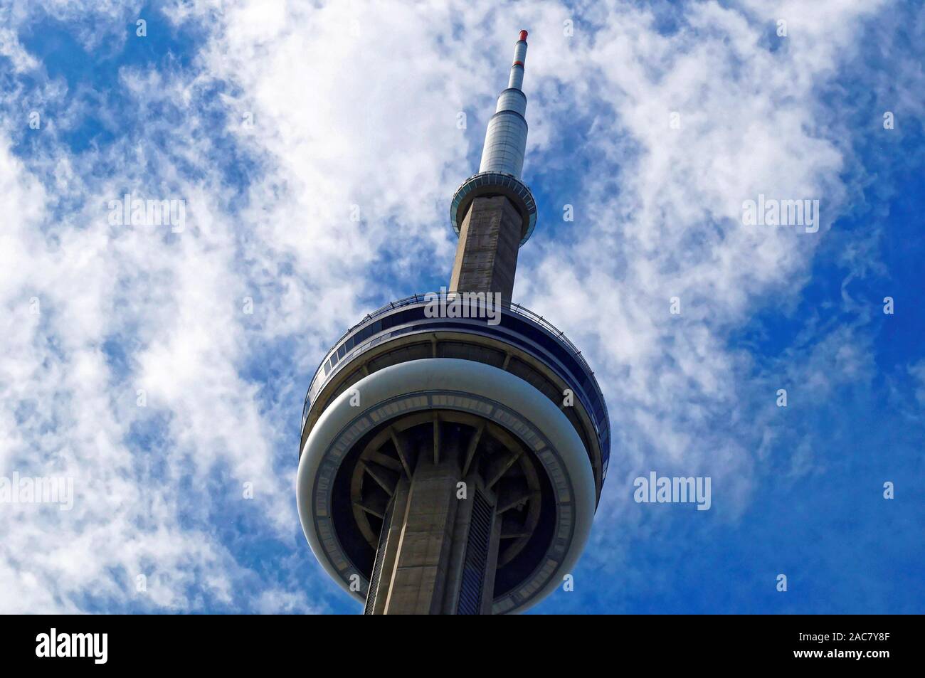 Toronto needle. CN Tower spire piercing blue sky of Toronto Stock Photo ...