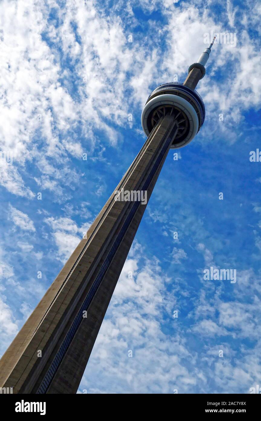 Toronto needle. CN Tower spire piercing blue sky of Toronto Stock Photo ...