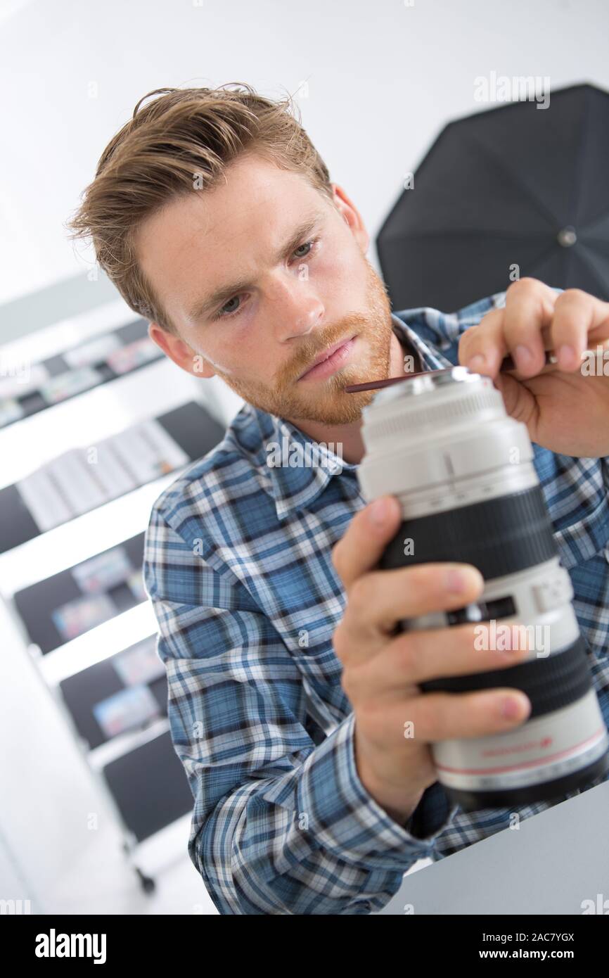 Person cleaning camera sensor hi-res stock photography and images - Alamy