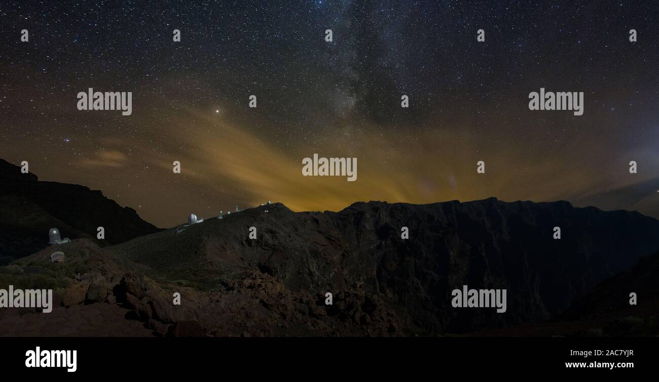 The top of giant volcano with astronomical Observatory under the bright ...