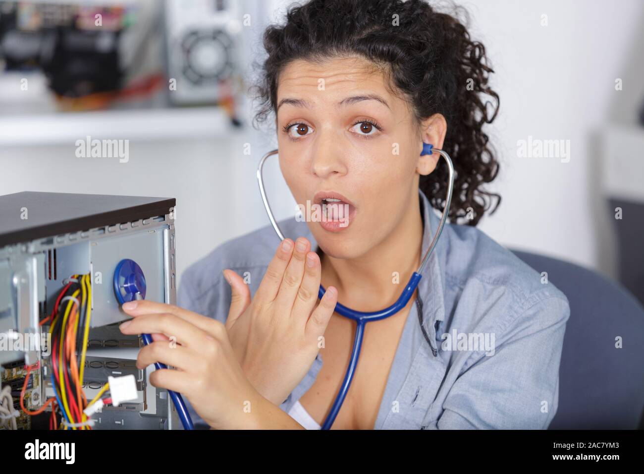 Professional female technician repairing hi-res stock photography and ...