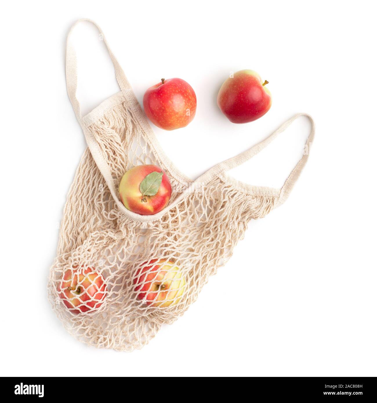 Organic garden apples in reusable eco net shopping bag Stock Photo - Alamy