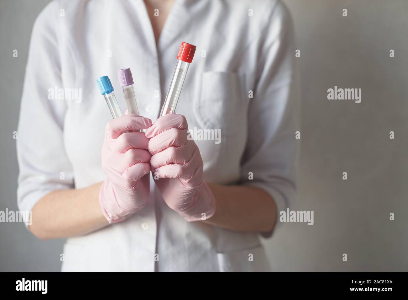 Nurse holds tubes for blood test. Close-up view Stock Photo - Alamy