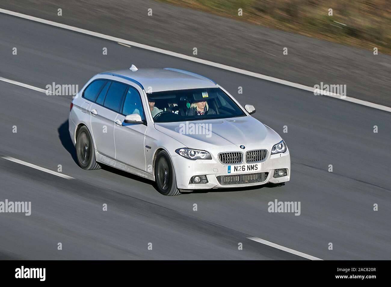 Blurred moving car N26NMS BMW 520D M Sport Auto traveling at speed on ...