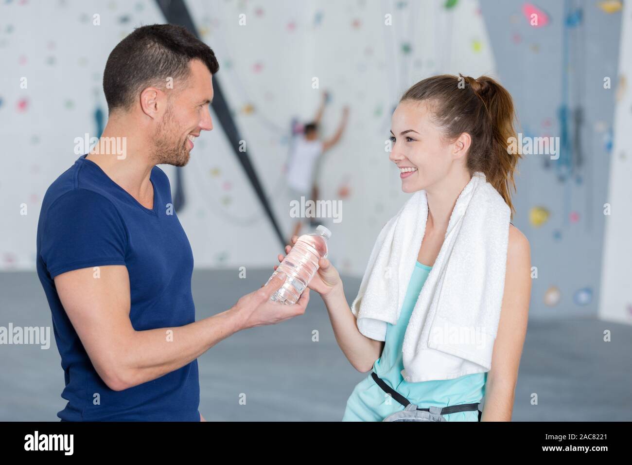 attractive young sports people are talking and smiling Stock Photo - Alamy
