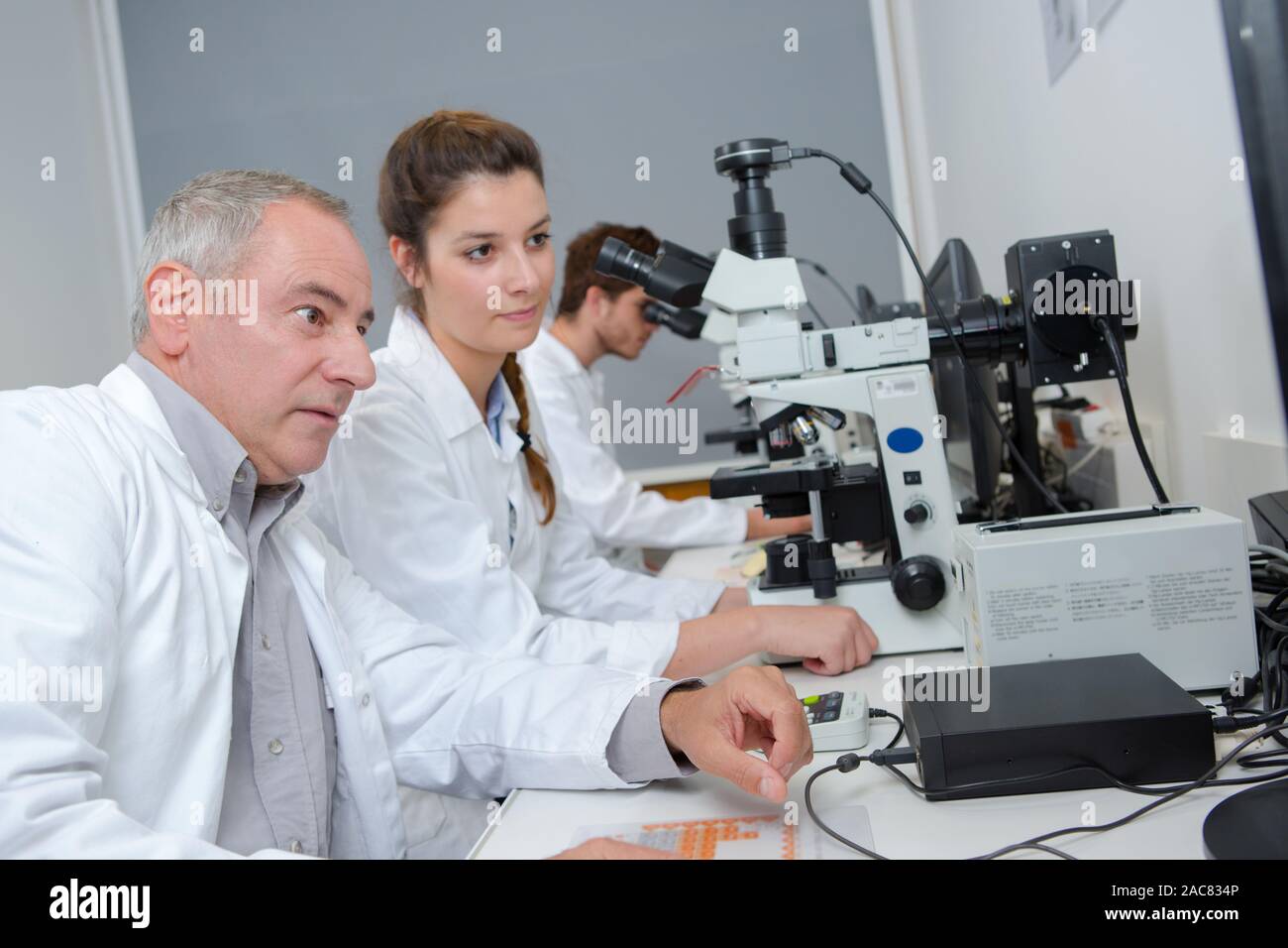 scientific researcher with female doctor Stock Photo - Alamy