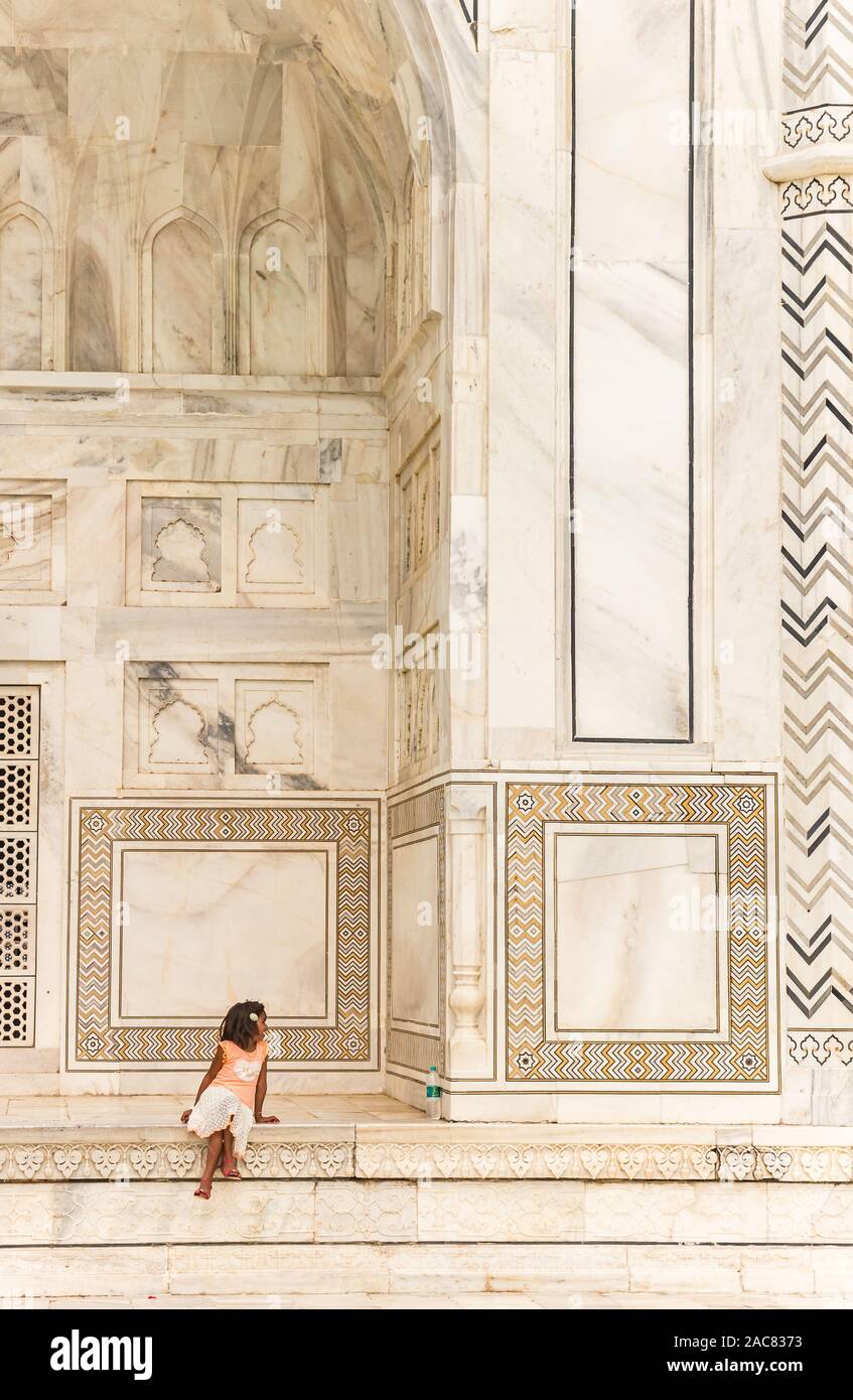 Little girl sitting at the Taj Mahal in Agra, India Stock Photo - Alamy
