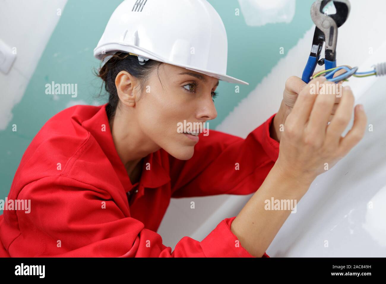 Repairman fixing ac hi-res stock photography and images - Alamy