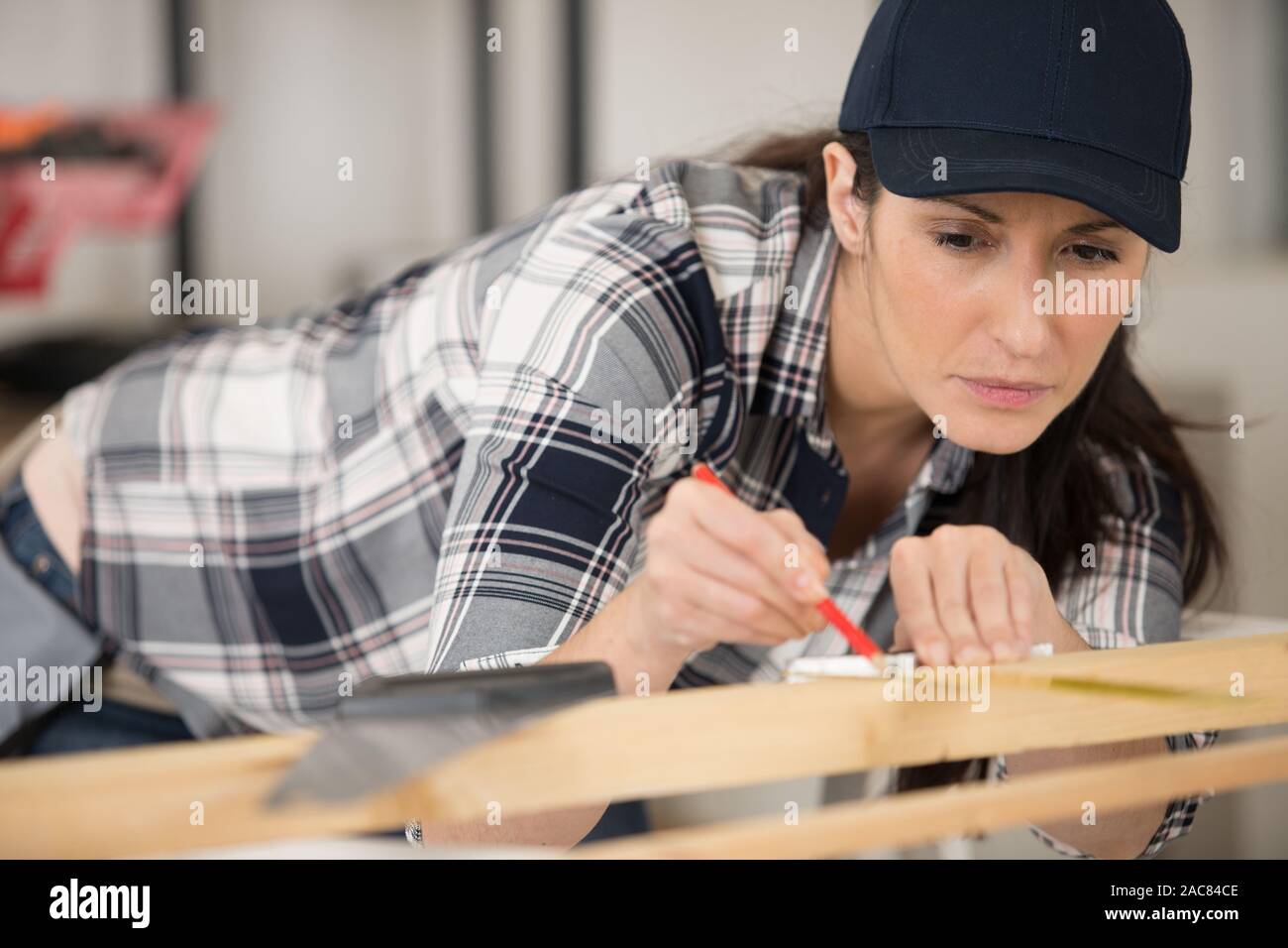 Female carpenter marking on hi-res stock photography and images - Alamy