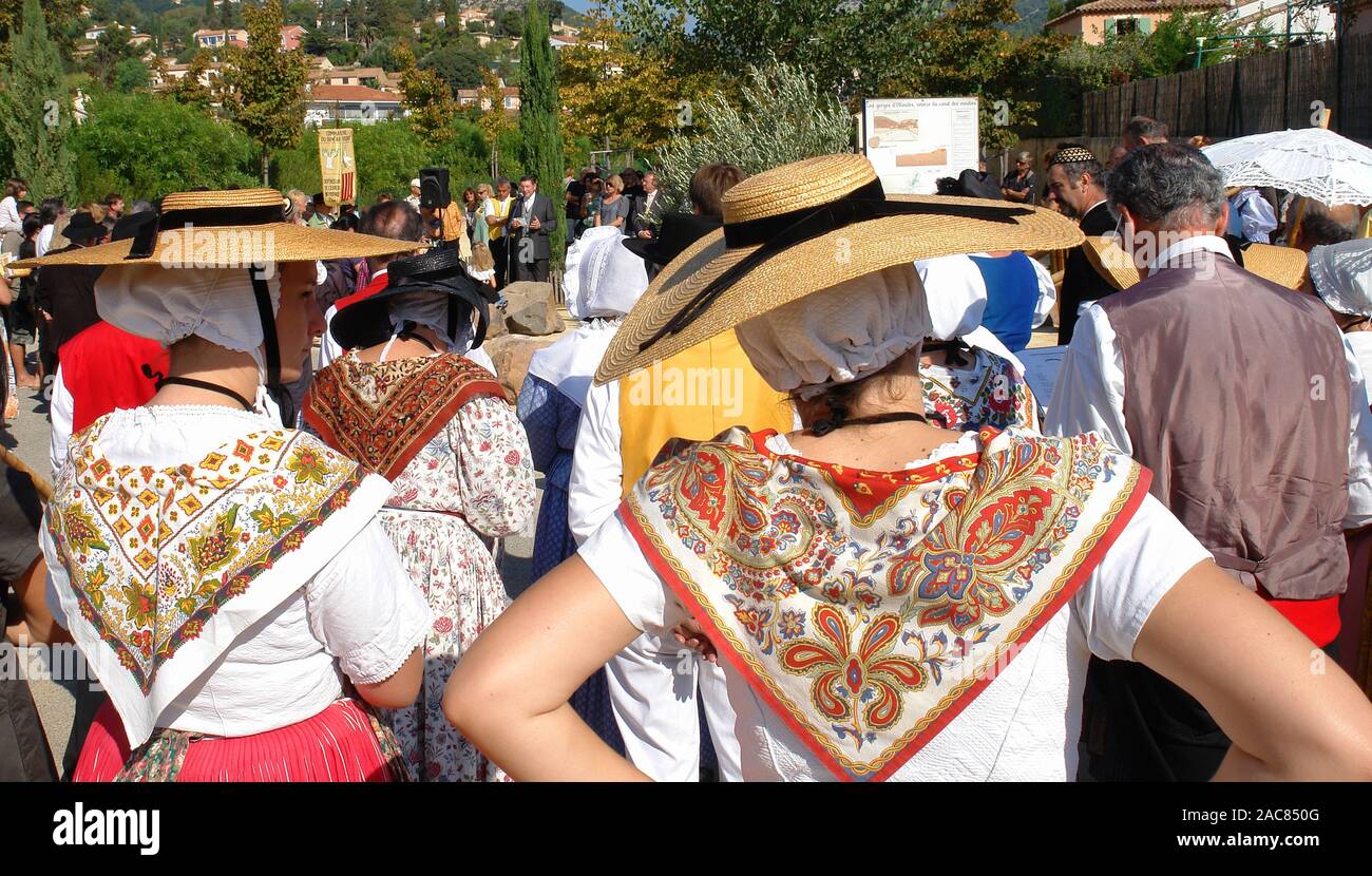 Women in traditional Provencal dress for the olive tree festival in ...