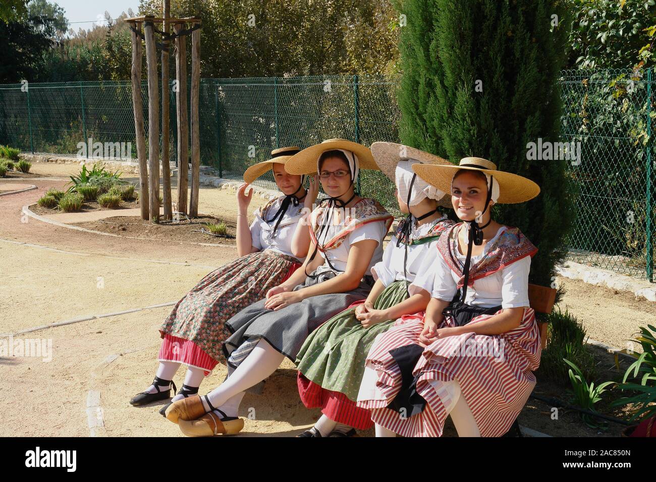 Women in traditional Provencal dress for the olive tree festival in ...