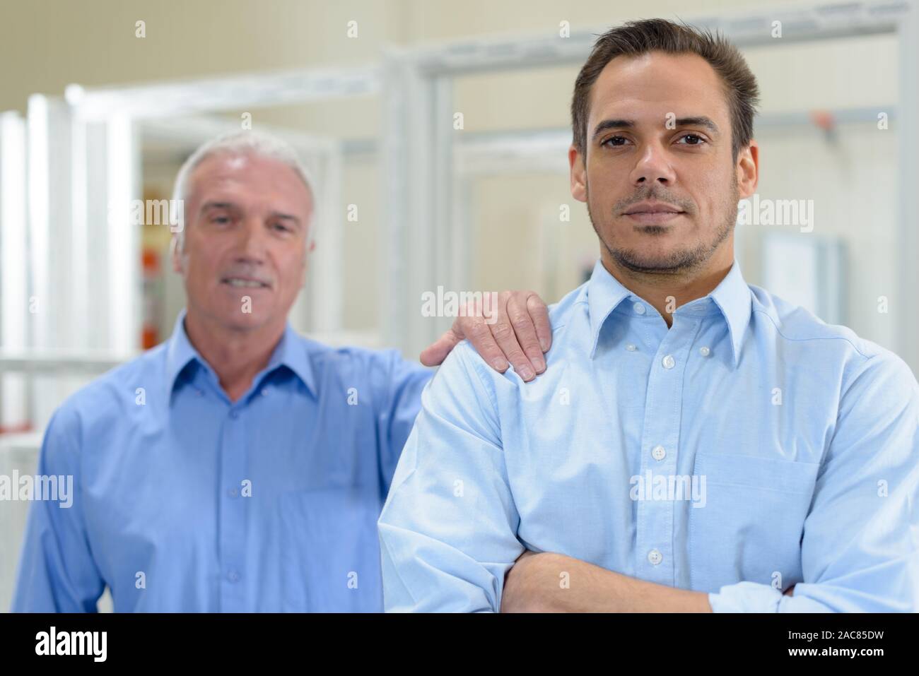 portrait of glass manufacturing owners posing Stock Photo - Alamy