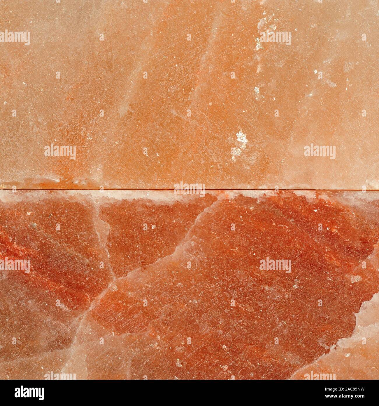 Himalayan pink salt block surface top view Stock Photo - Alamy