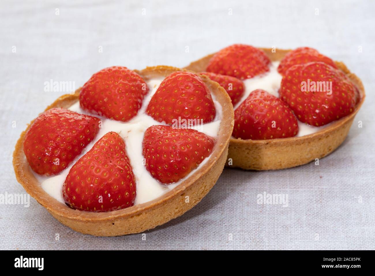 Two custard tarts hi-res stock photography and images - Alamy