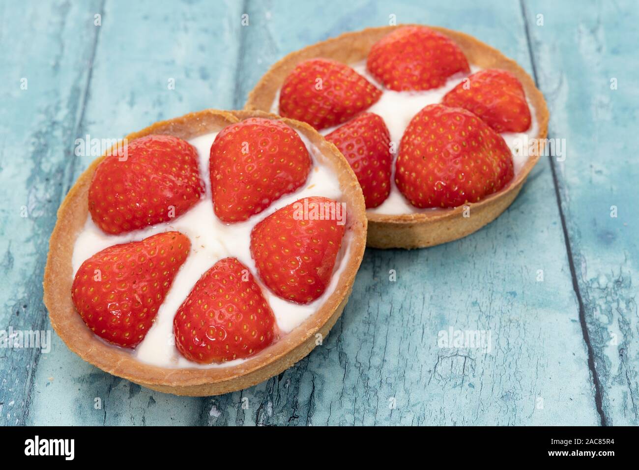 Two custard tarts hi-res stock photography and images - Alamy