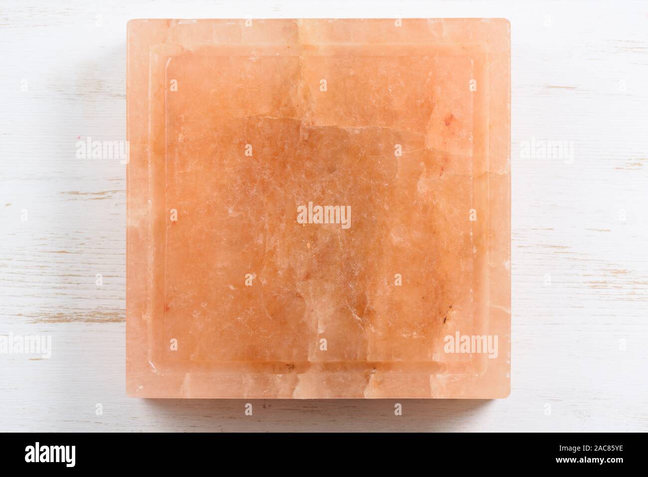 Square Hymalayan pink salt block with cracks top view Stock Photo - Alamy