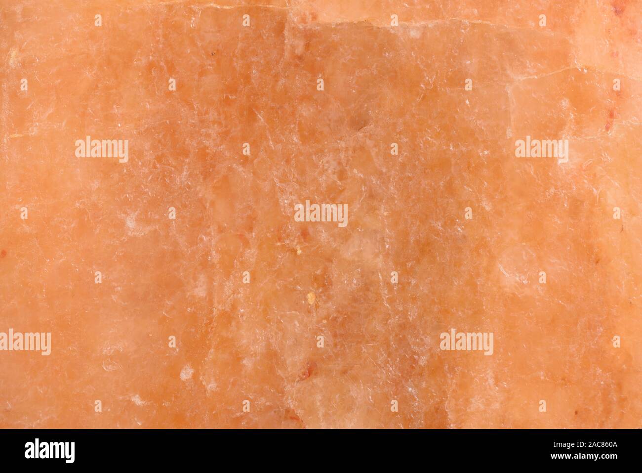 Hymalayan pink salt block surface texture Stock Photo - Alamy