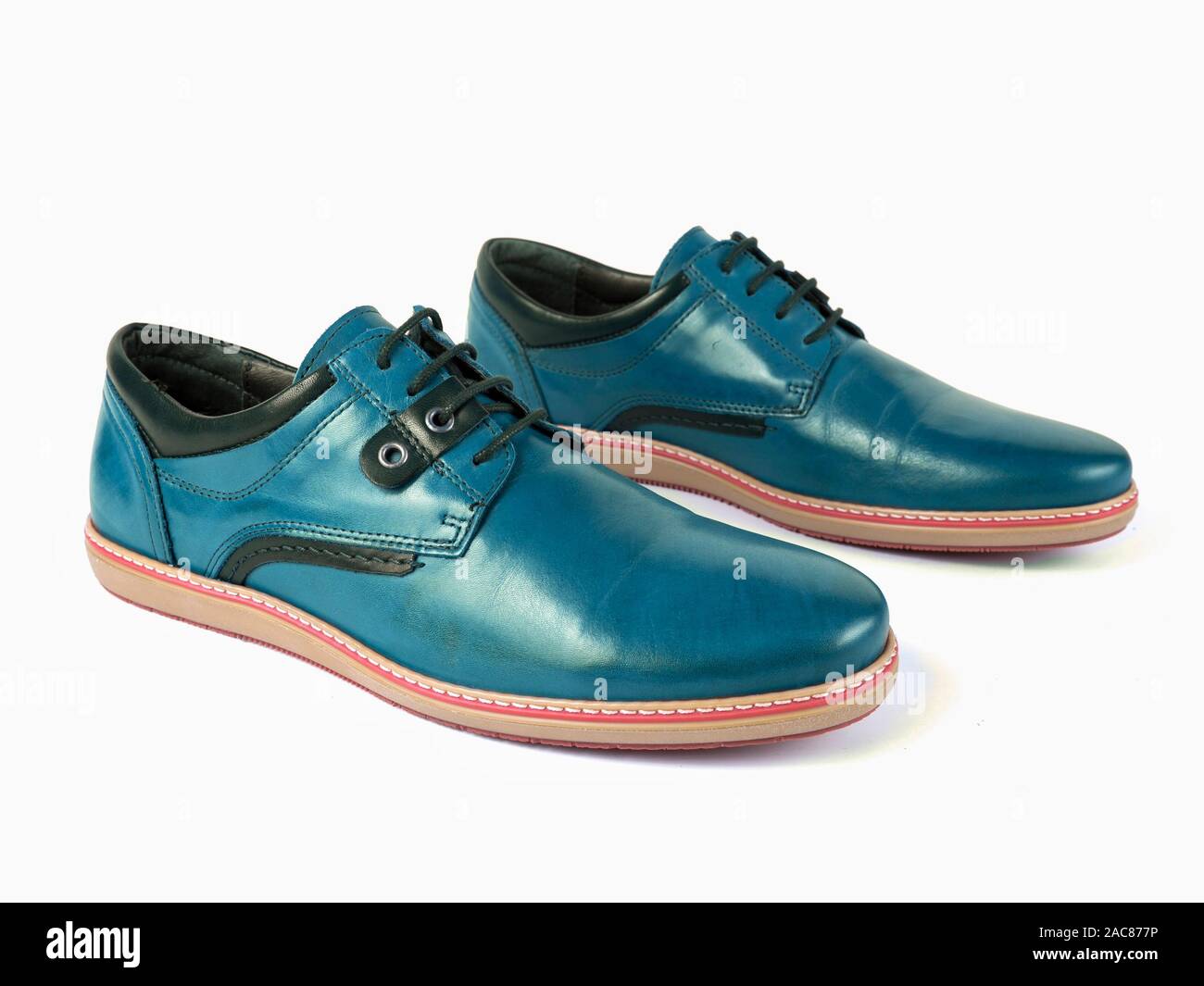 Pair of male cyan leather shoes on white background, isolated product ...