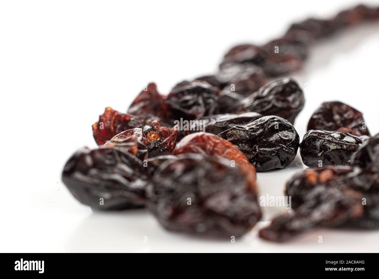 Lot of whole dried cowberry isolated on white background Stock Photo ...