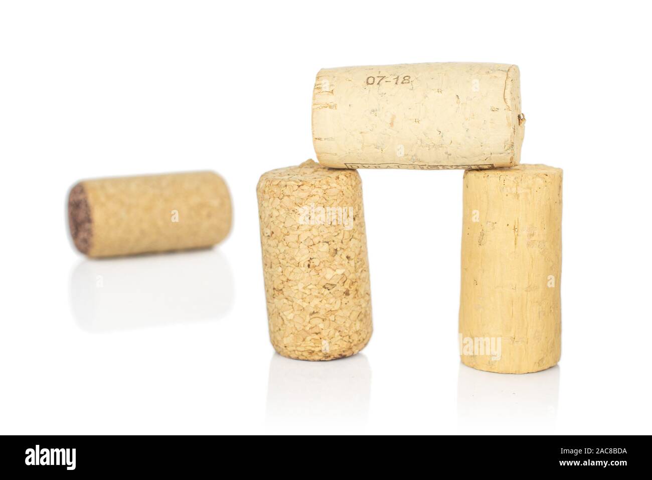 Group of four whole common wine cork isolated on white background Stock ...