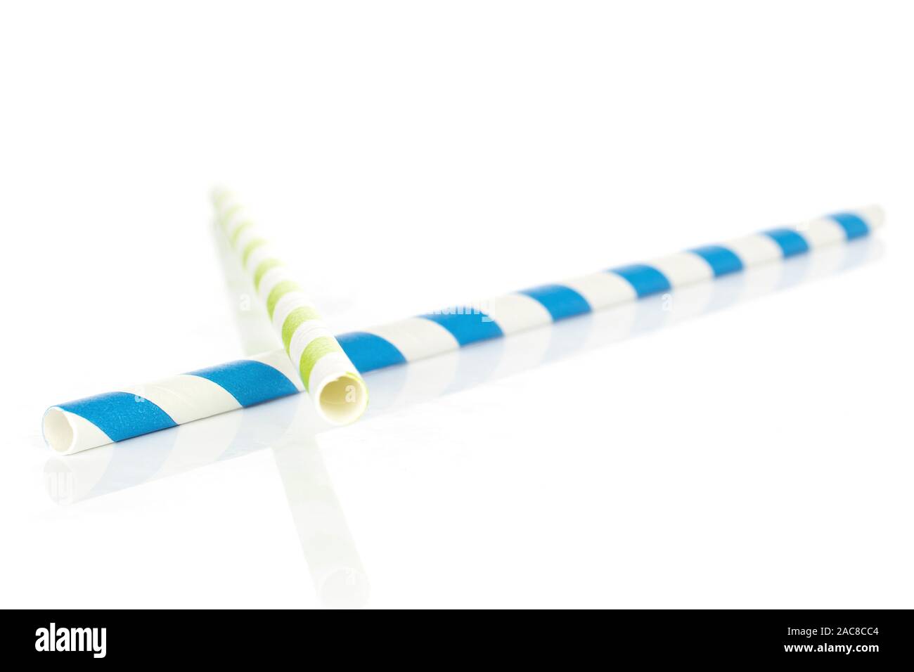 Group of two whole paper straw isolated on white background Stock Photo ...