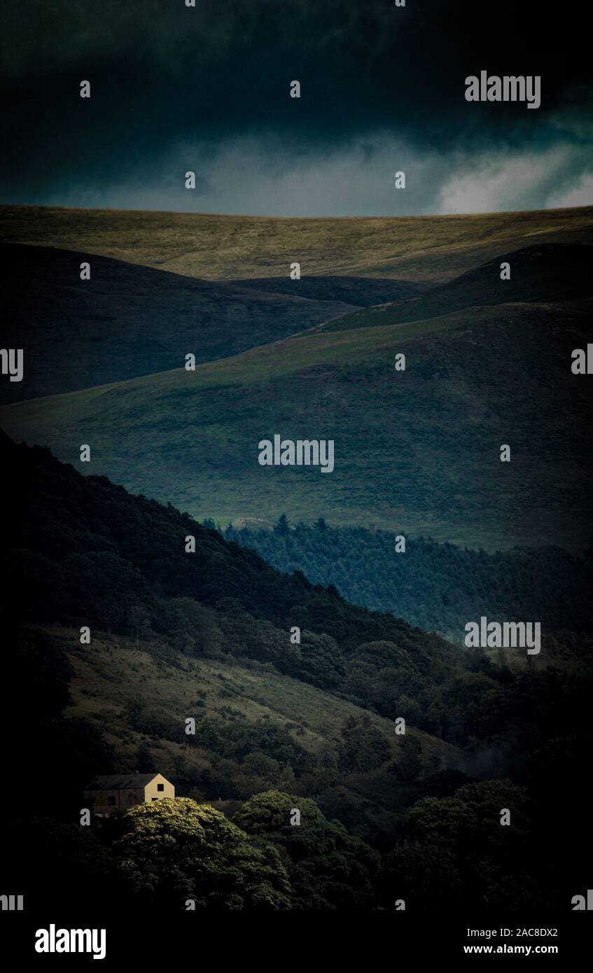 Single building in moody landscape Stock Photo - Alamy