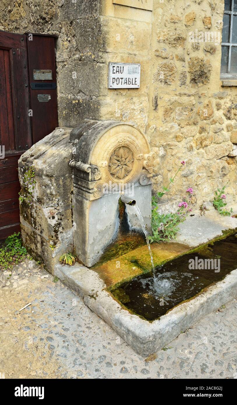 Ancient spring of potable water in the French town Saint Medard Stock ...