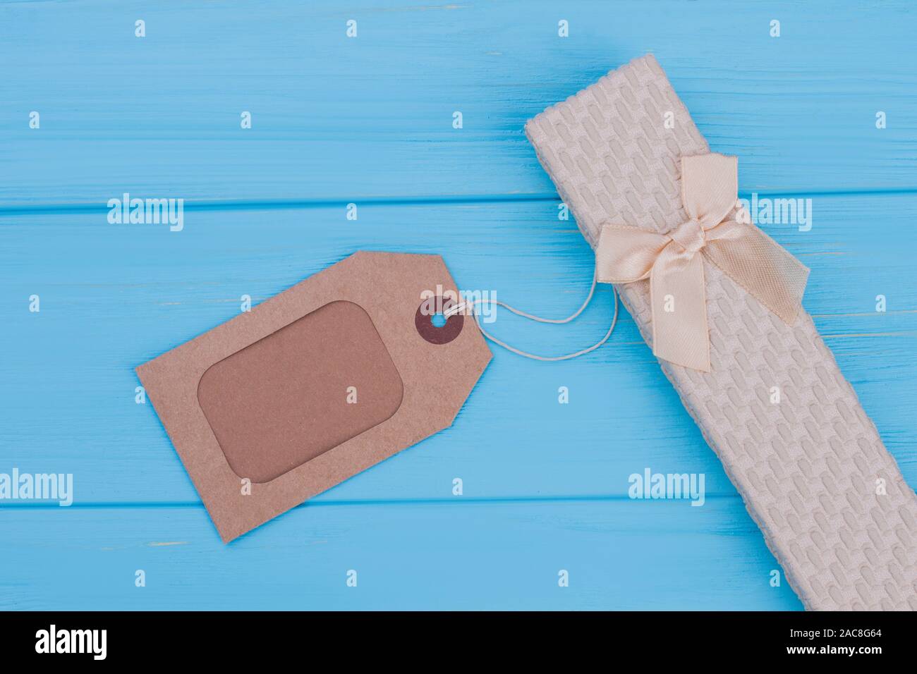 Long present gift box and blank label Stock Photo - Alamy