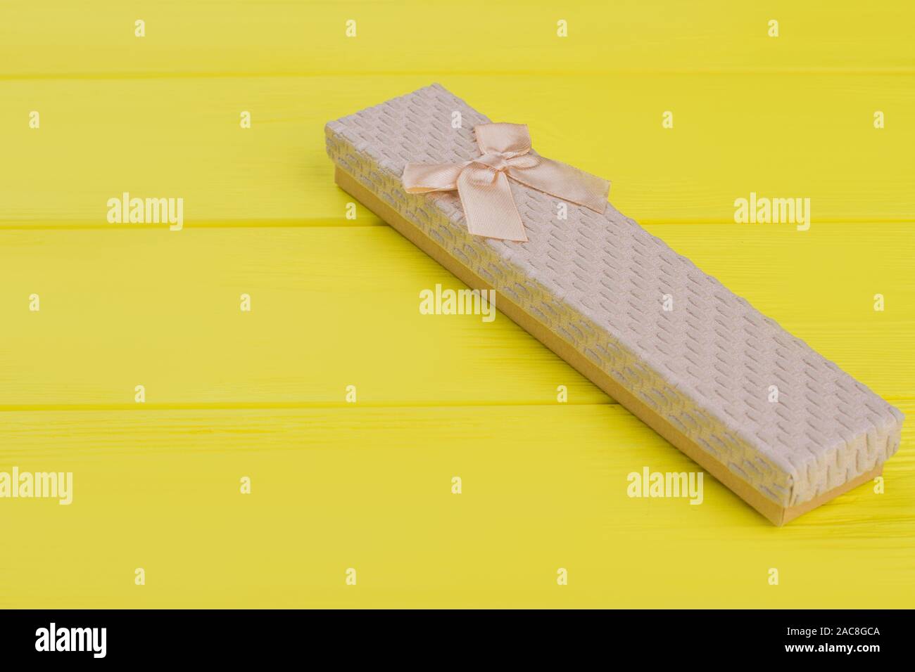 Yellow long gift box hi-res stock photography and images - Alamy