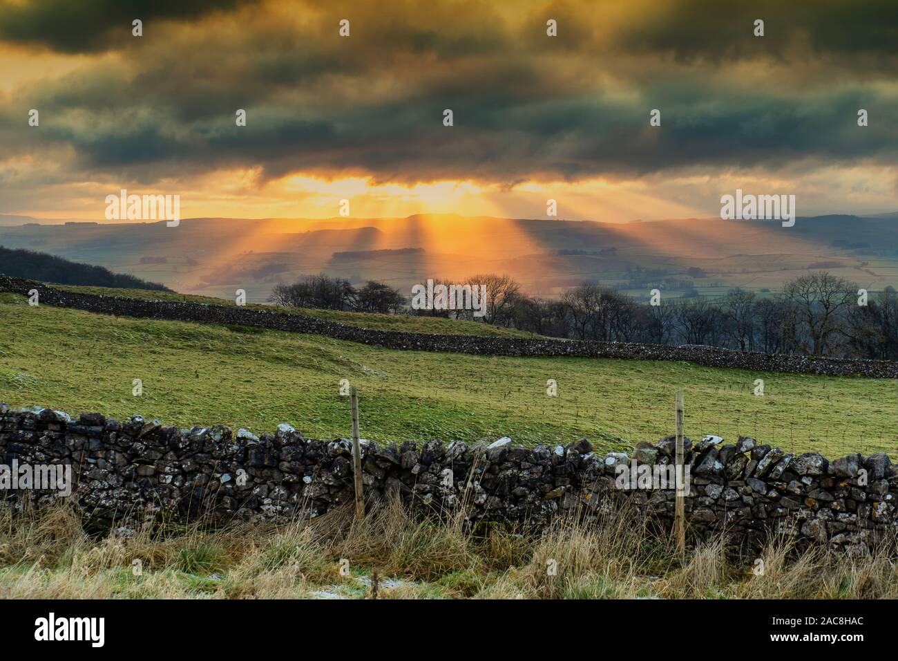 Settle sunset at Winskill Stones near Langcliffe in the Yorkshire Dales ...