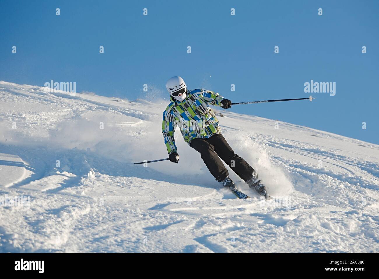 Skiing in fresh powder snow Stock Photo - Alamy