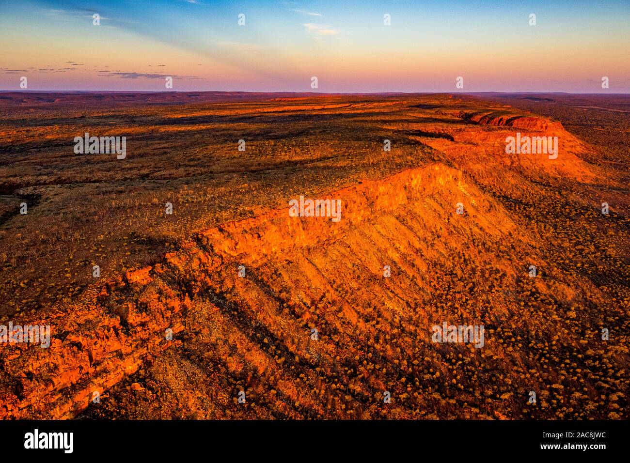 Sunset in the Australian outback. This aerial image shows the remote ...