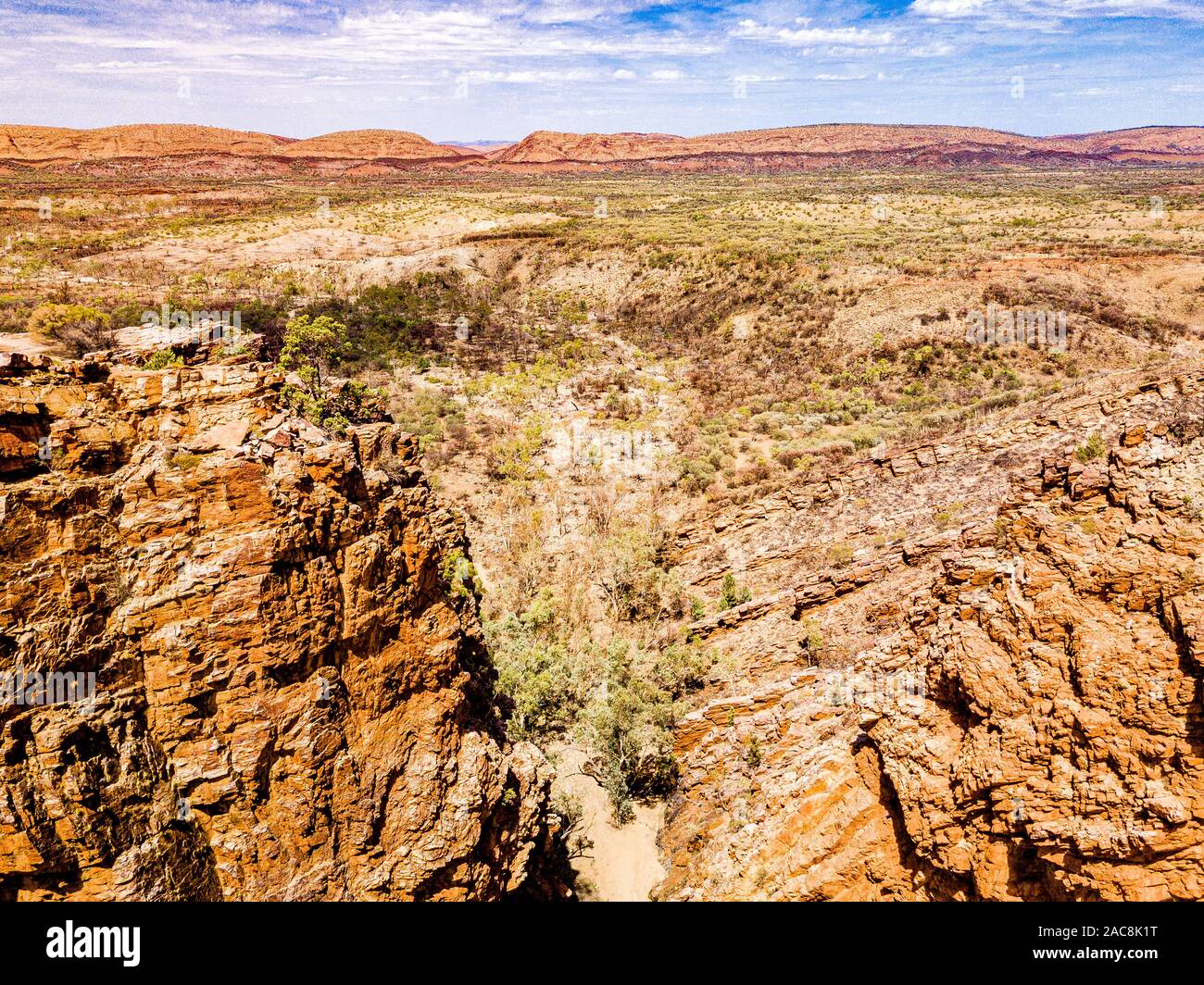 The dramatic rocky mountain landscape surrounding Serpentine Gorge in ...