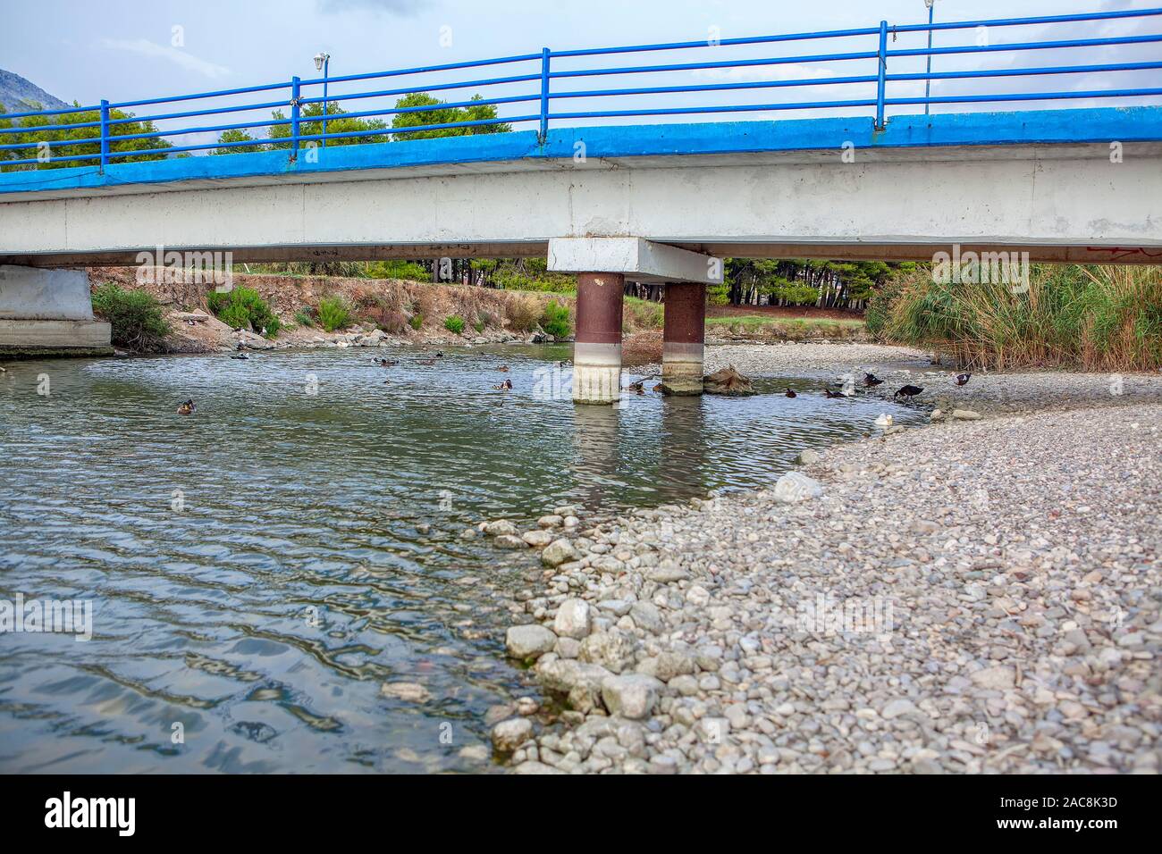 pedestrian bridge across the river Stock Photo - Alamy