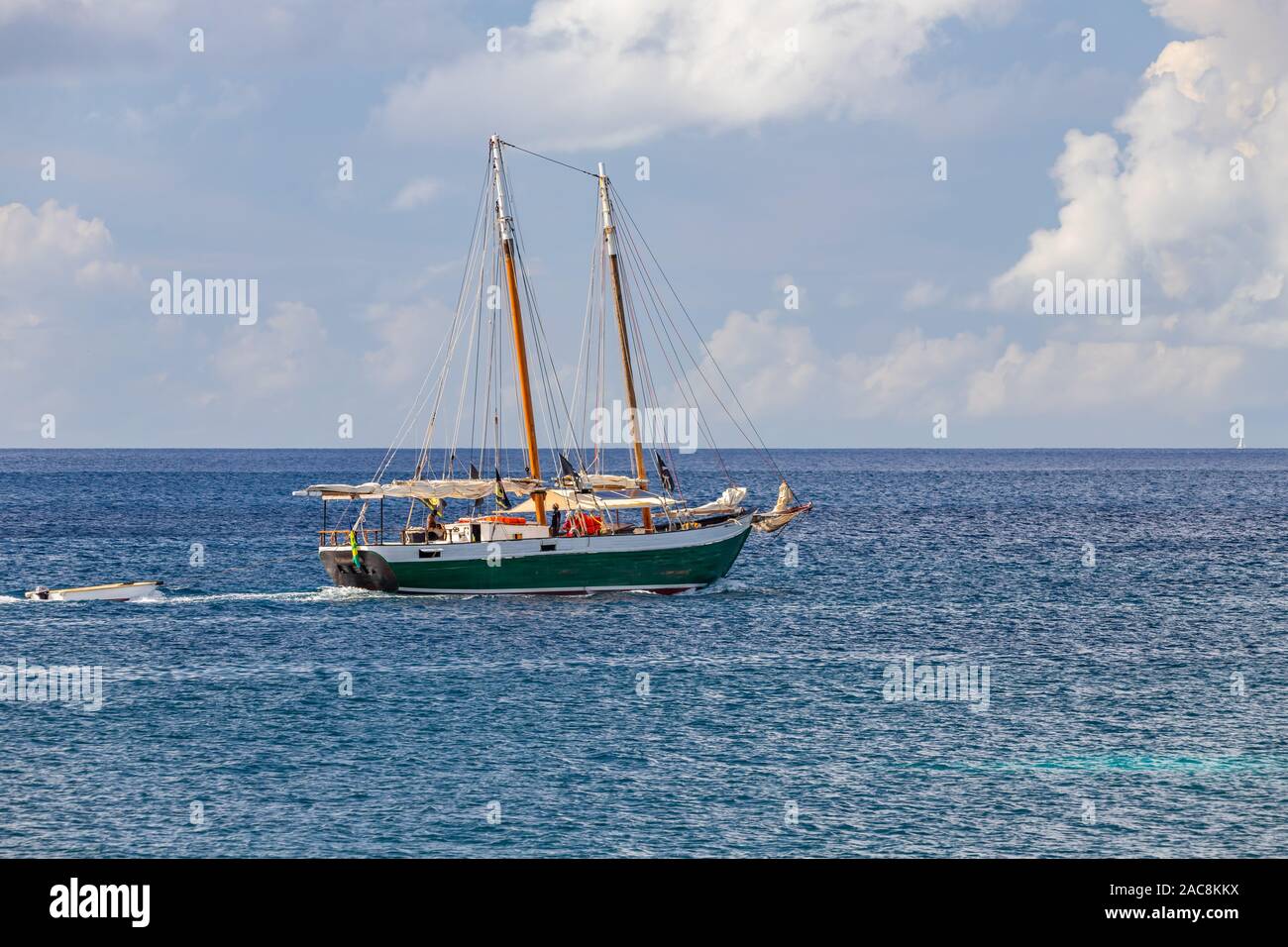 Saint Vincent and the Grenadines, Sailboat ketch with pirate flags ...