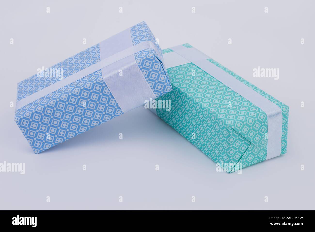 Two festive gift boxes isolated Stock Photo - Alamy