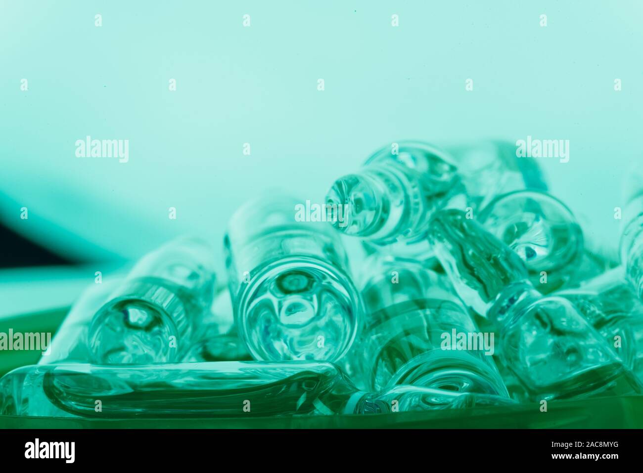 Glass medical ampoule vial for injection. Medicine is liquid sodium ...