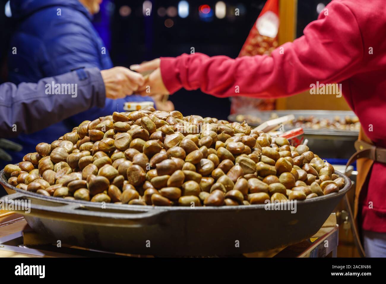 Hot chestnut stall in market hi-res stock photography and images - Alamy