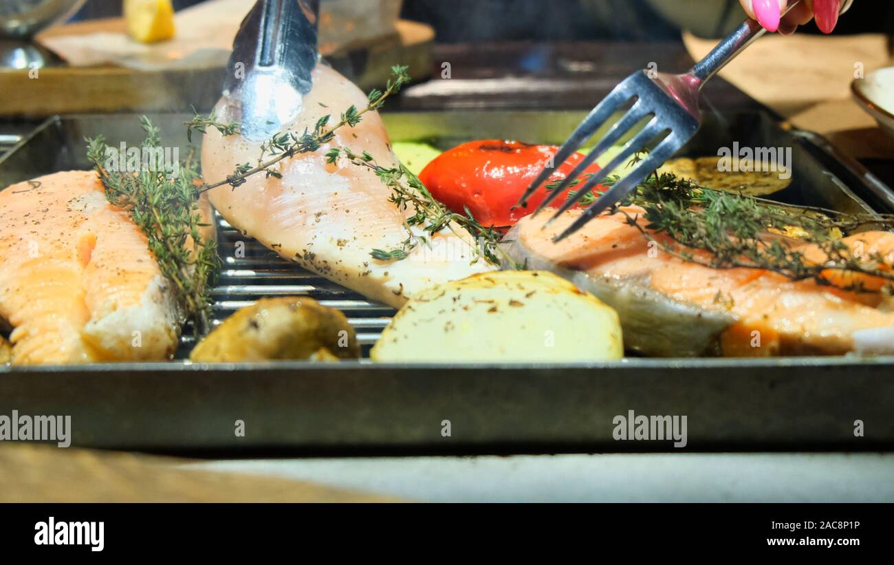 Grilled fish, grilled salmon steak, chicken, aromatic spices and ...