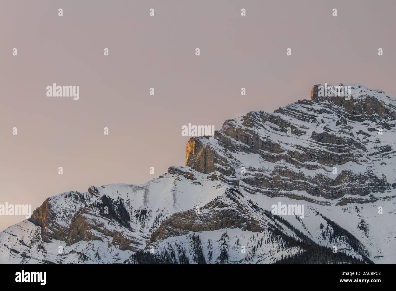 Banff Cascade Mountain Sunset Colours during winter Stock Photo - Alamy