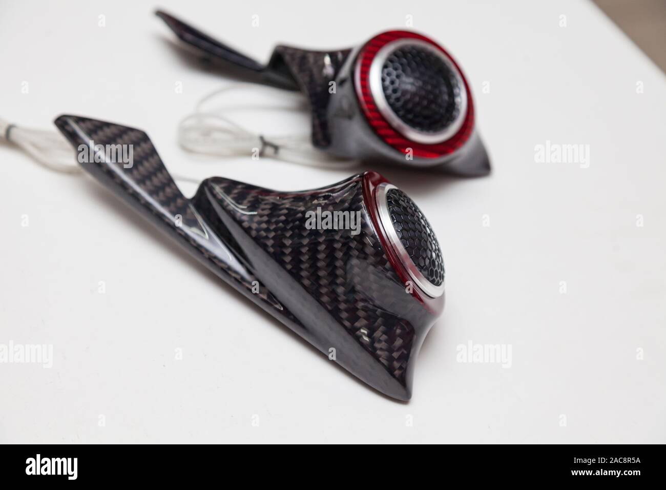 Two high-frequency speakers from a car with carbon fiber housings with ...