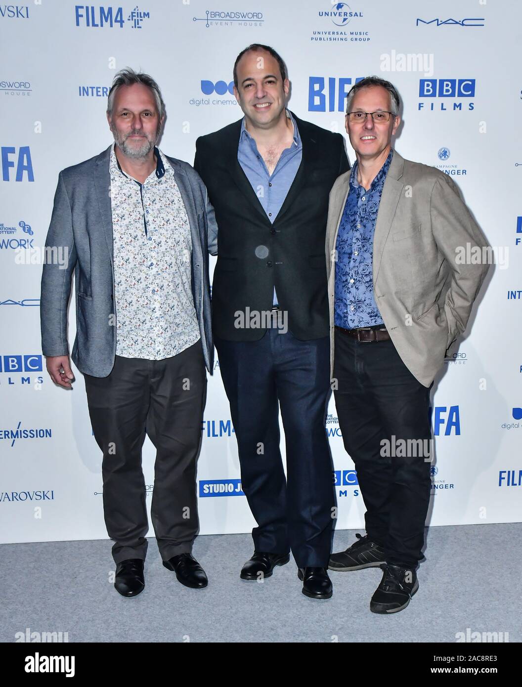 London, UK. 1st Dec 2019. Marcus Lewis, Simon Chinn and Alex Lewis ...