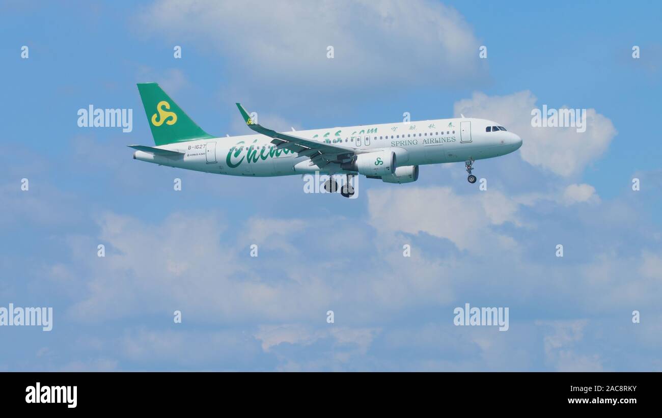 Spring Airlines Airbus A320 in the sky Stock Photo - Alamy