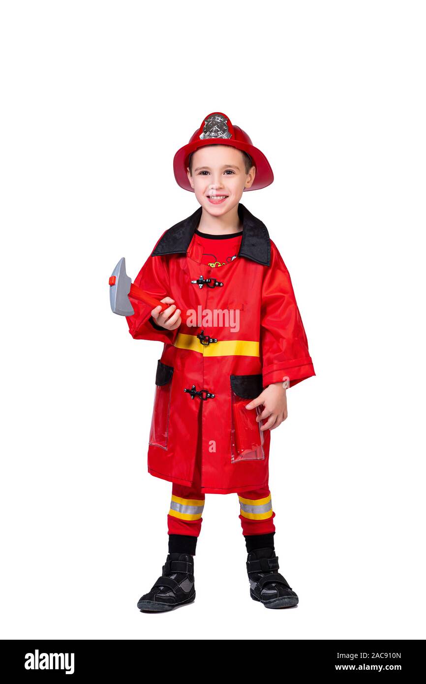 little cheerful boy in a fireman's robe: a red helmet with a coat of ...